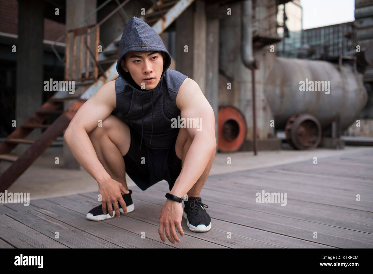 Young man resting after running Stock Photo - Alamy Young man resting after running Stock Photo - Alamy