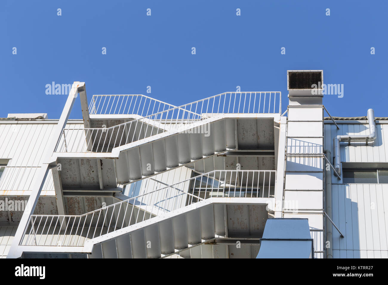 Outdoor Emergency Stairwell for fire exit with Air Duct Stock Photo - Alamy