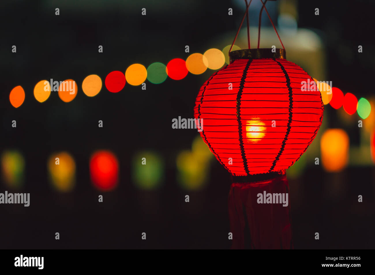 Chinese Paper Lamp Red color hanging at Night Stock Photo - Alamy