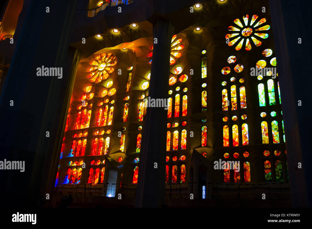 Sagrada Familia stained glass windows in noon Stock Photo - Alamy