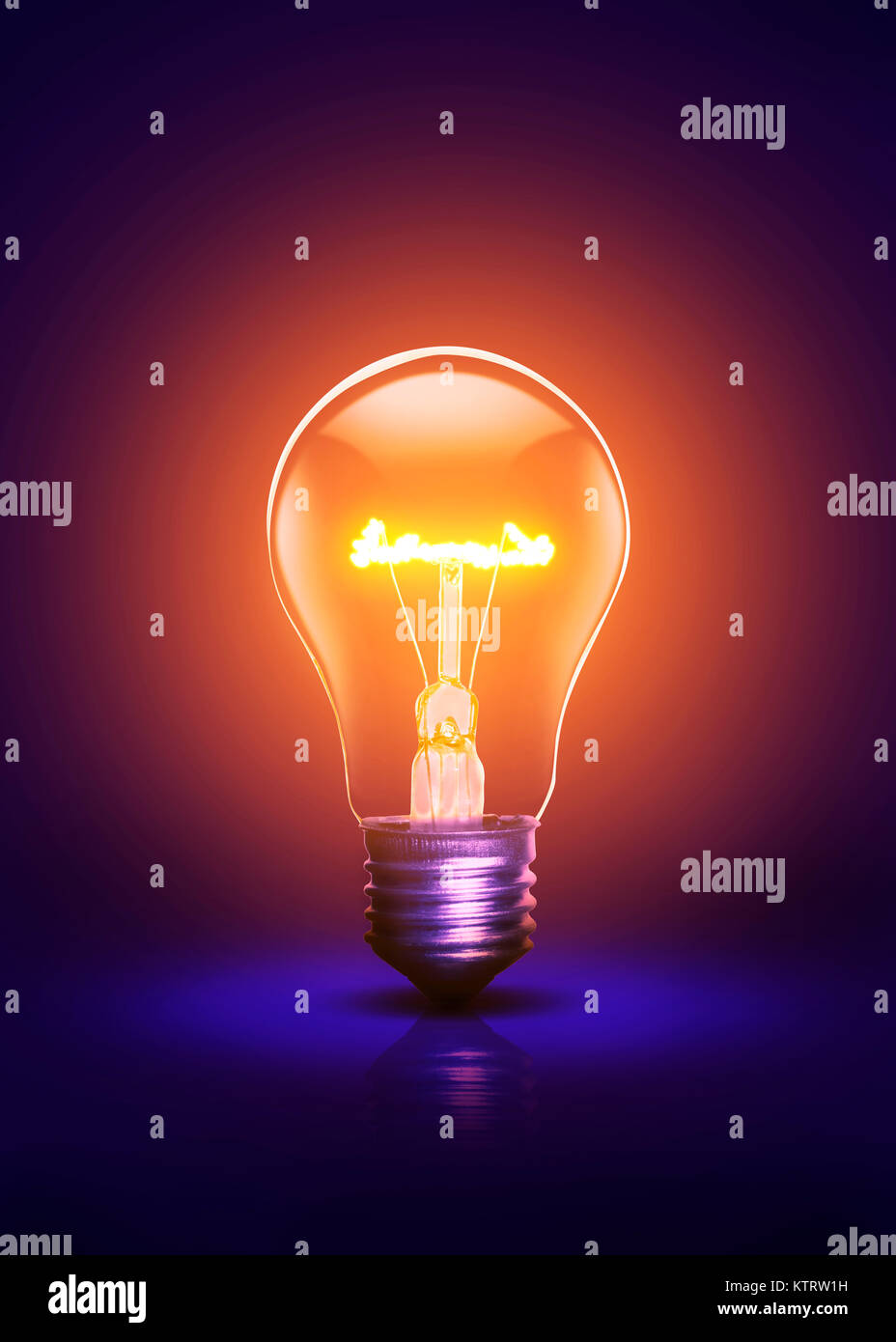 Warm colored and active bulb on a dark purple background Stock Photo ...
