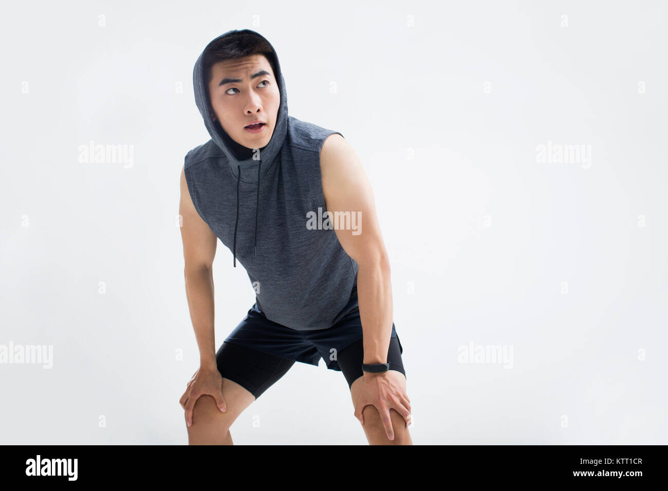 Young man resting after running Stock Photo - Alamy Young man resting after running Stock Photo - Alamy