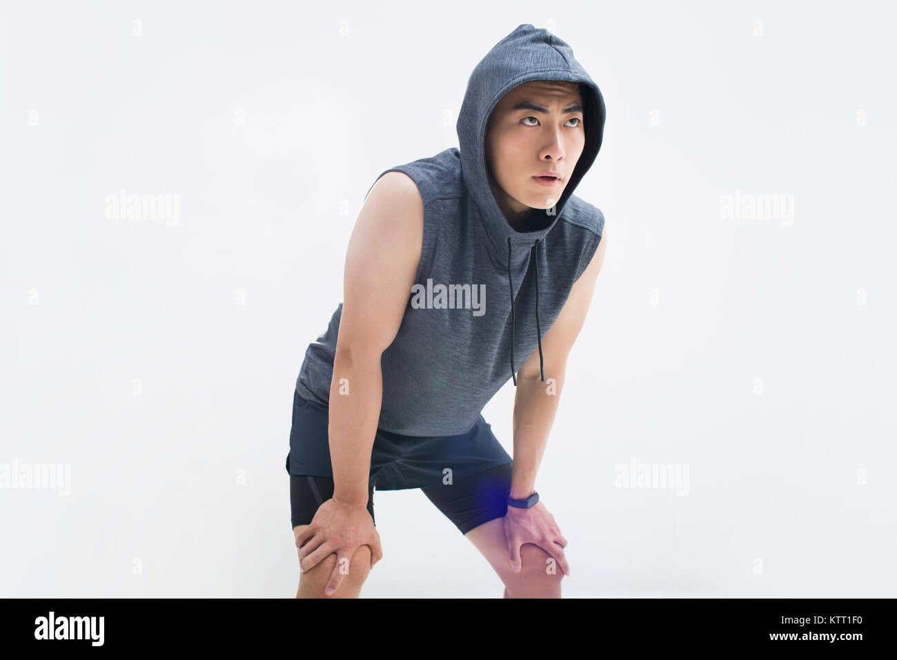 Young man resting after running Stock Photo - Alamy Young man resting after running Stock Photo - Alamy