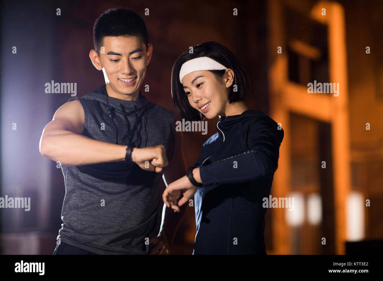 Smart couple running at night hi-res stock photography and images - Alamy
