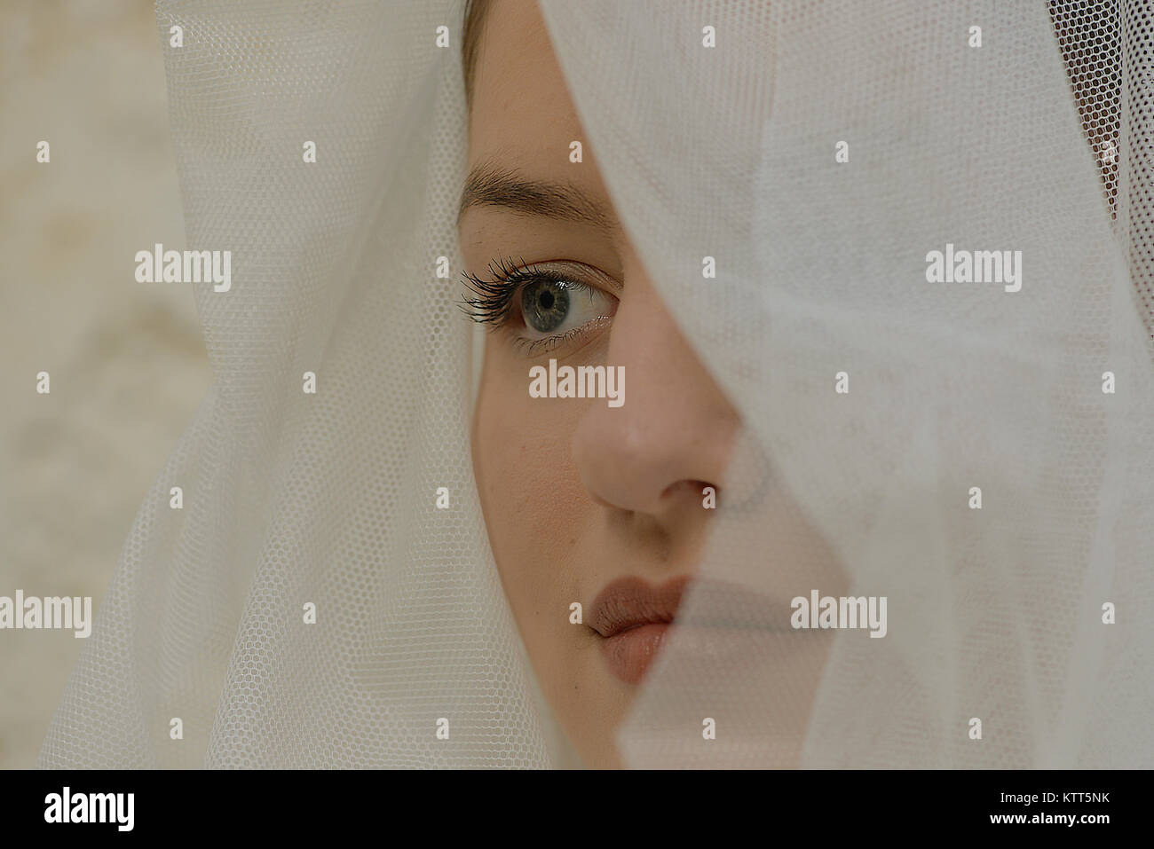 Portrait of a teenage girl wearing a veil Stock Photo - Alamy