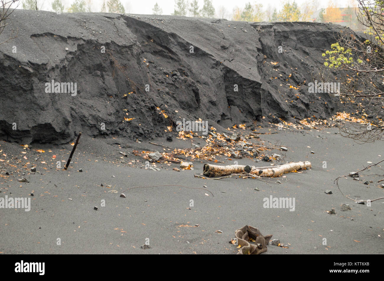 Water erosion in slag heaps. Postindustrial landscape of abandoned ...