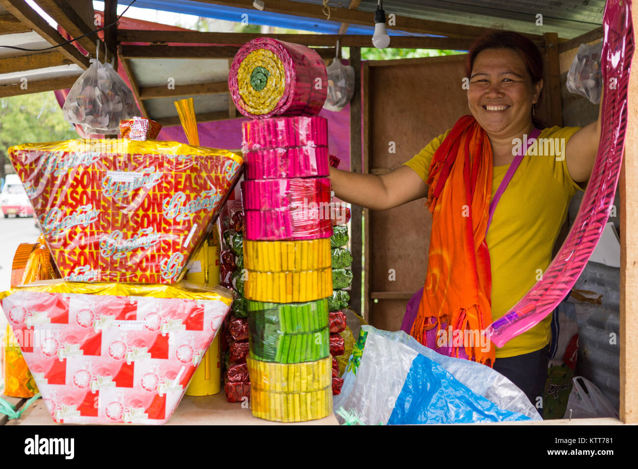 A smiling women behind the counter of her fireworks stall prior to New ...