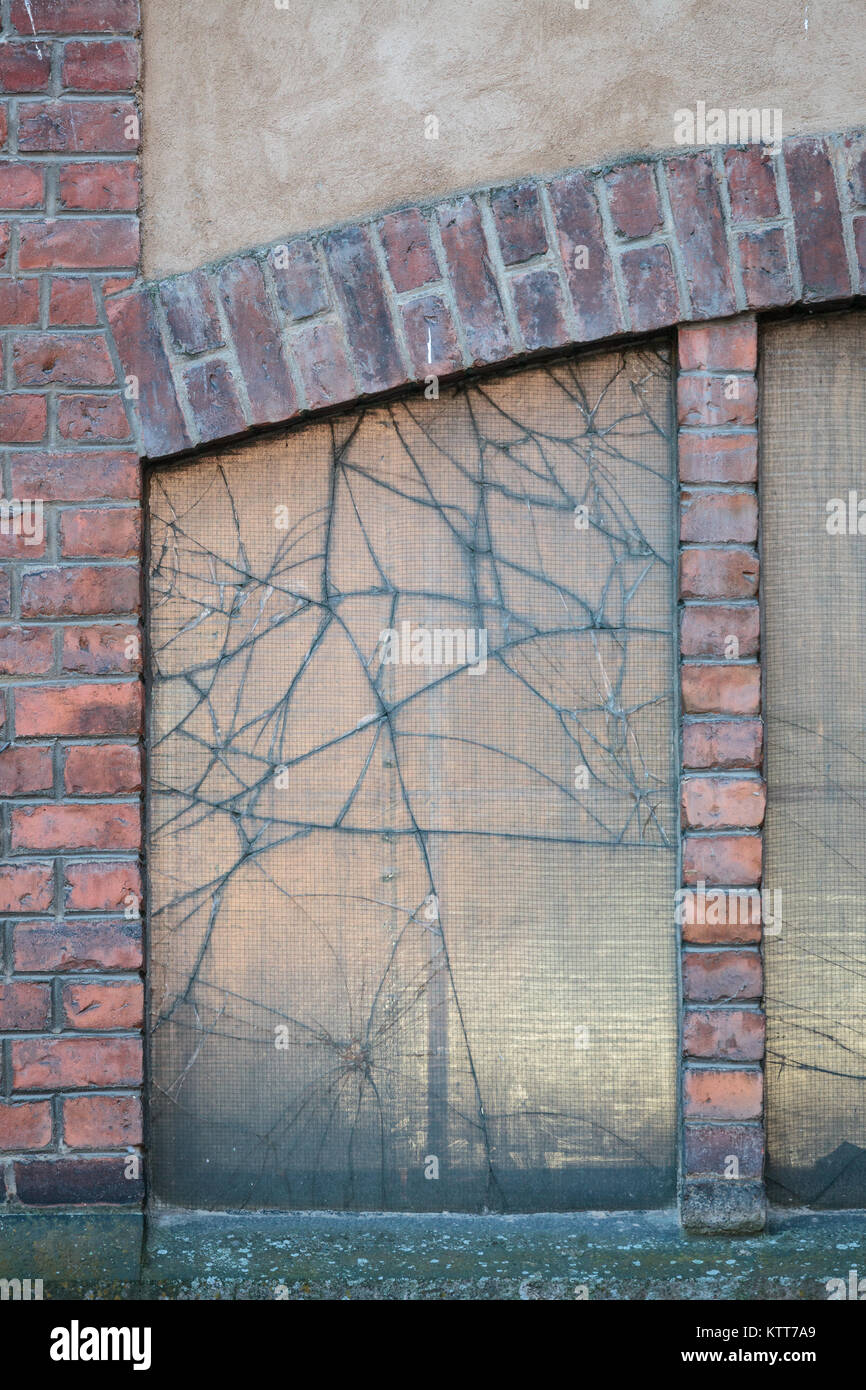 Broken window in old factory building Stock Photo - Alamy