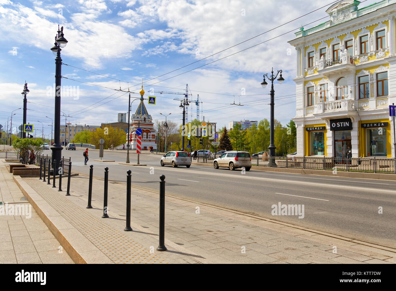 Editorial.Russia, Siberia, Omsk, May 12 2017. Cars moving on a street ...