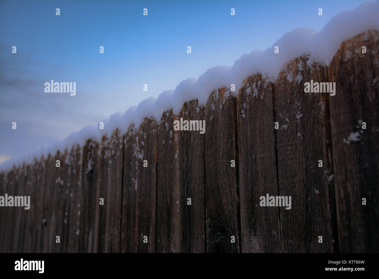 Fence with snow Stock Photo - Alamy