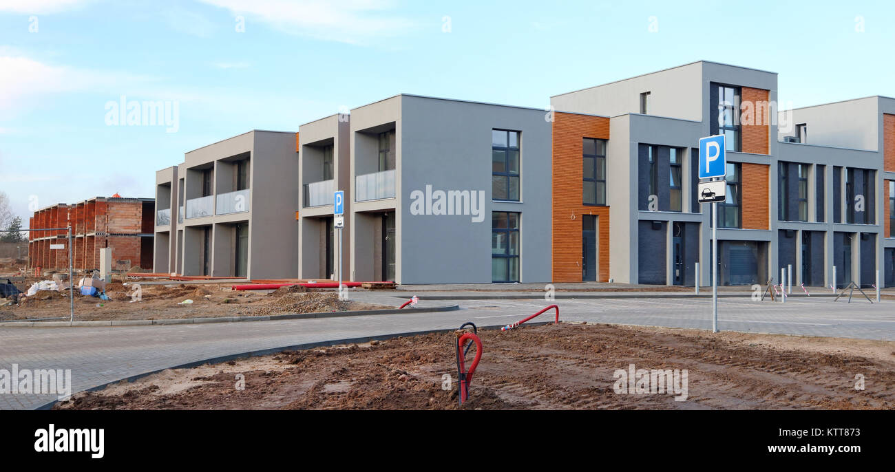 Panorama of a modern standard no name houses buildings construction in ...