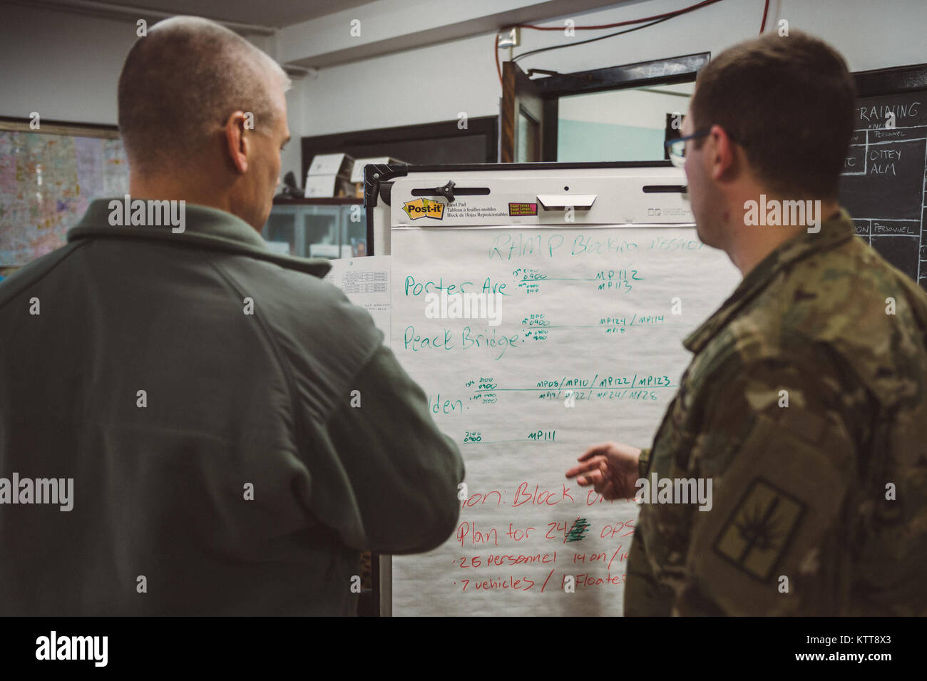 Lt. Col. Michael Fowler, commander of Joint Task Force-5, receives ...