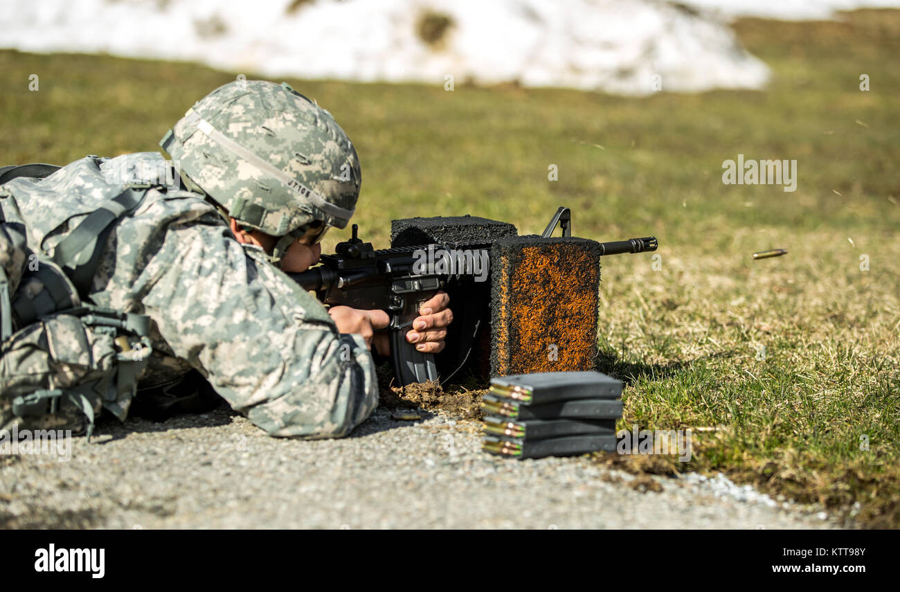 A Soldier zeroes his weapon before shooting a weapon qualification ...