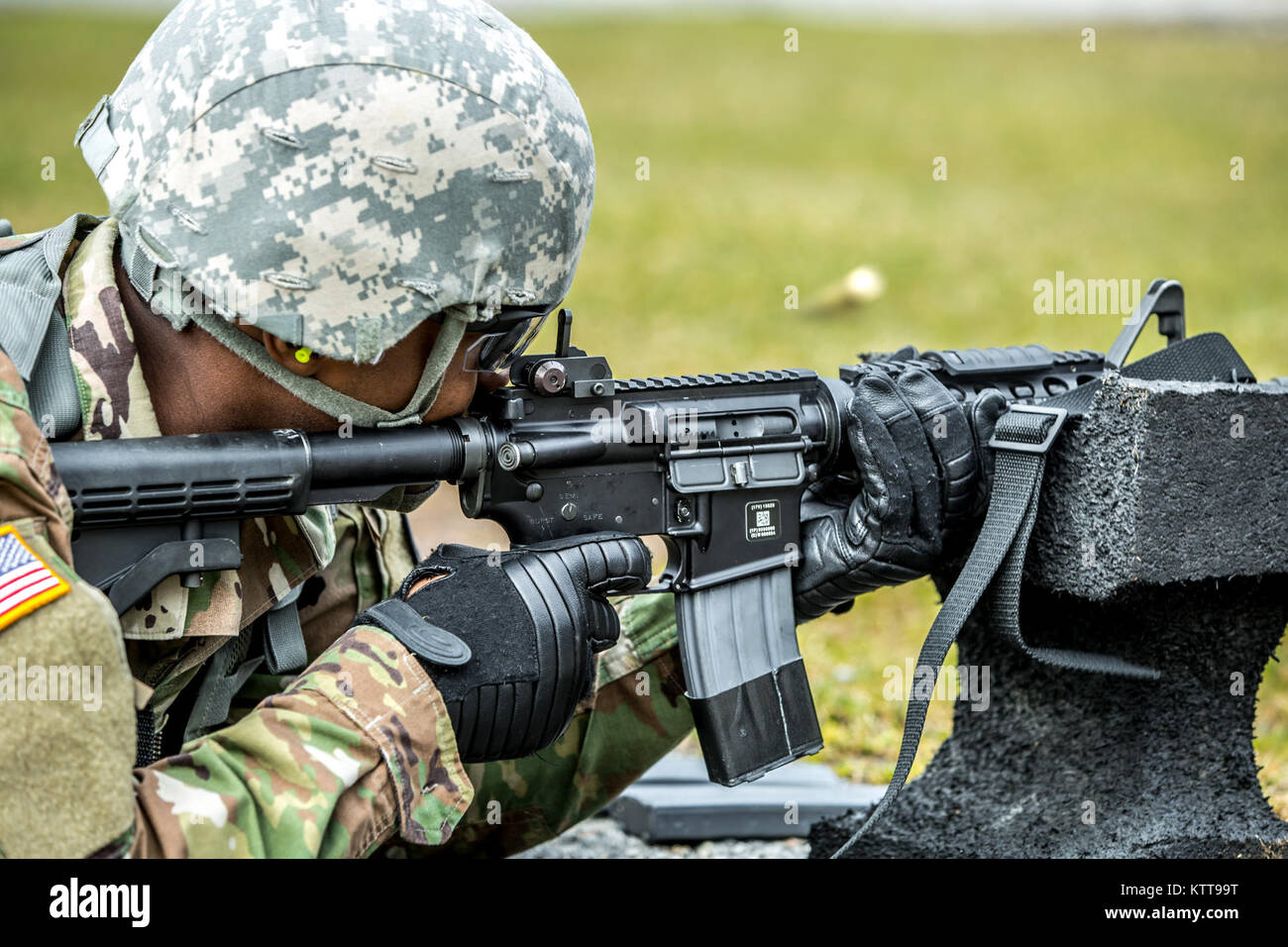 U.S. Army Pfc. Julius Forde fires his M4 during the weapon ...