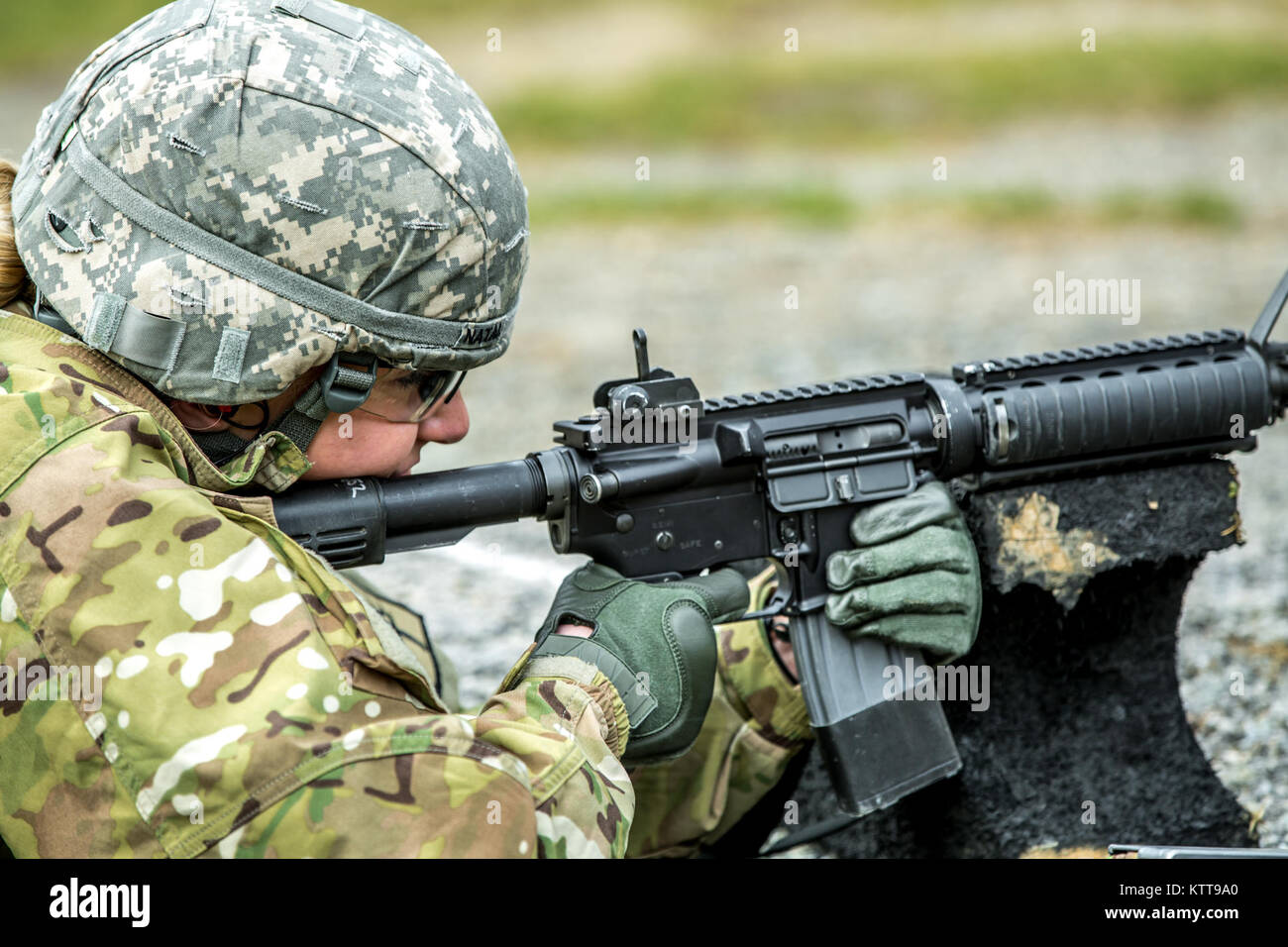 U.S. Army Spc. Courtney Natal qualifies with the M4 rifle during the ...