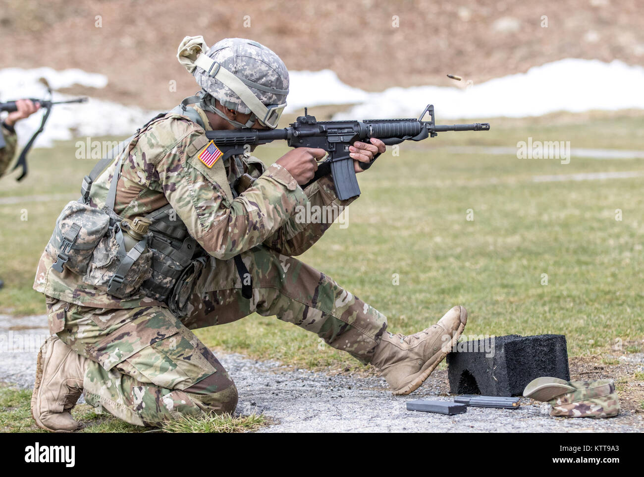 A Soldier fires during the weapon qualification for the New York Army ...