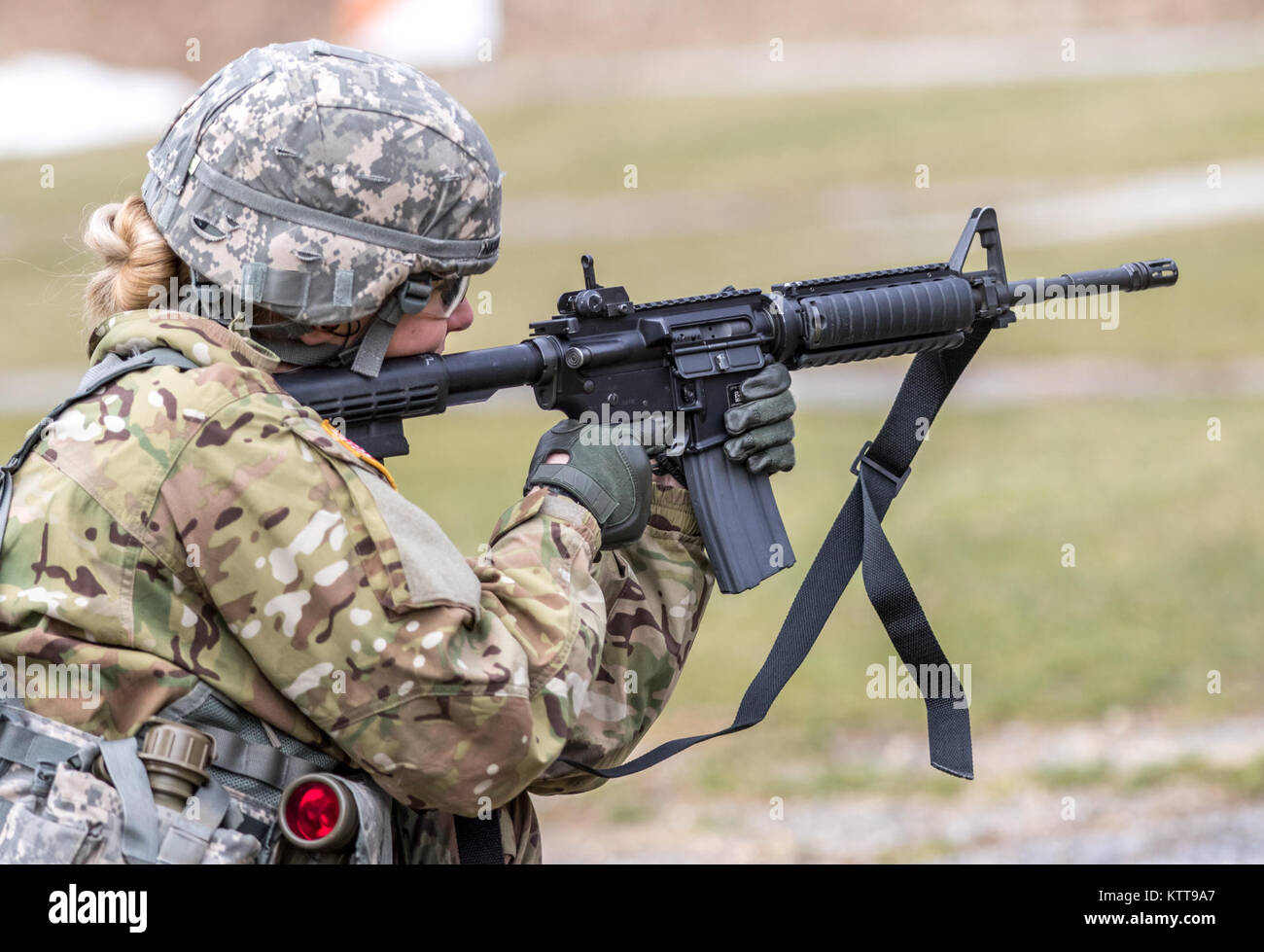 A Soldier fires during the weapon qualification for the New York Army ...
