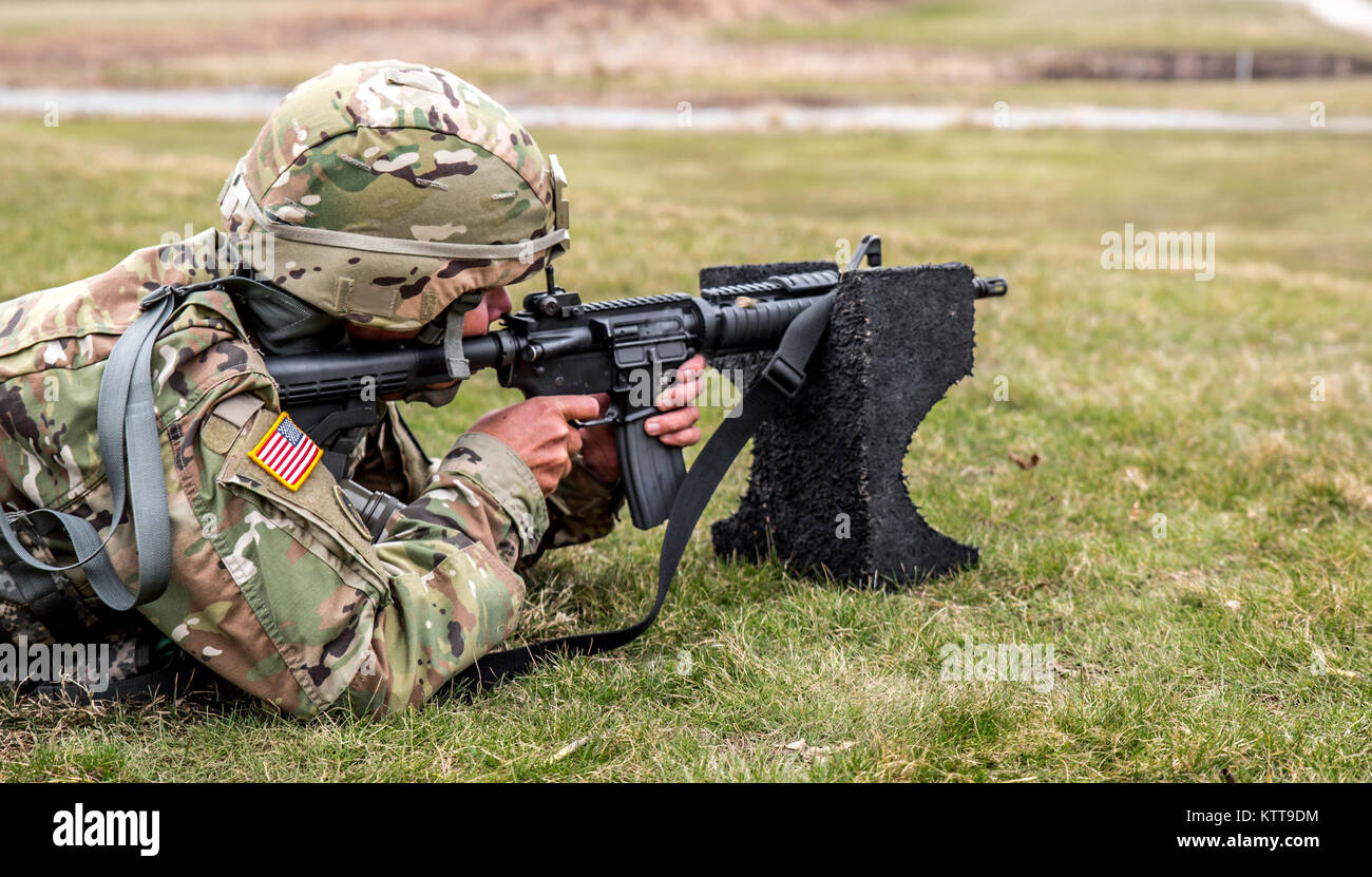 U.S. Army Sgt. 1st Class Jeffrey Mason runs through the stress shoot ...