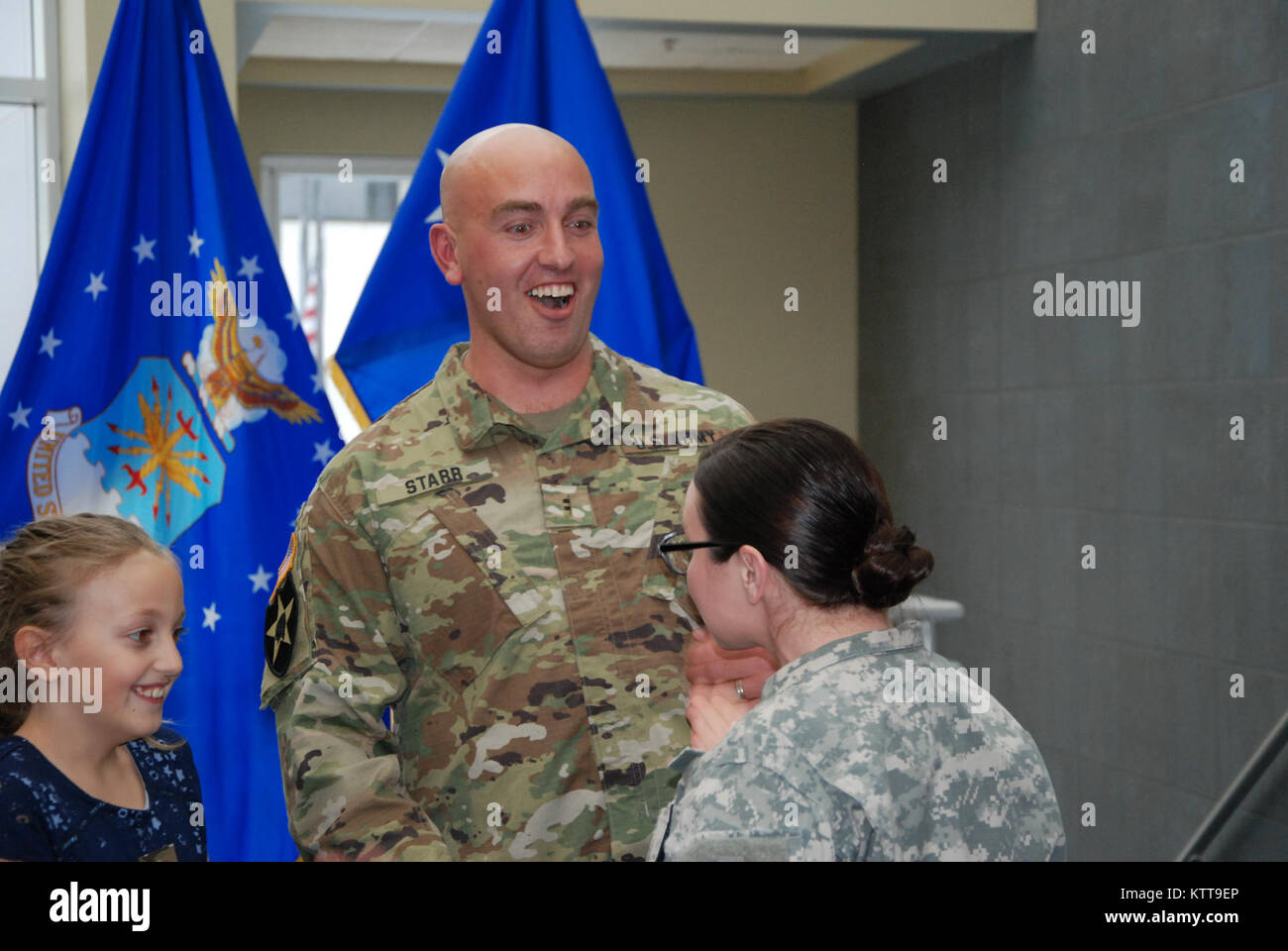 Chief Warrant Officer 2 Matthew Starr is congratulated following his ...