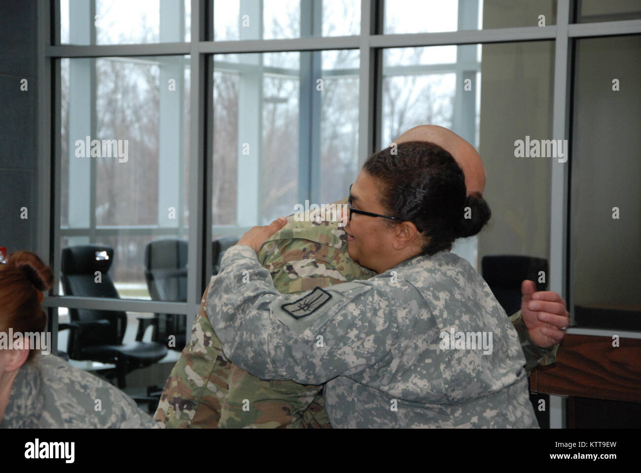 Chief Warrant Officer 2 Matthew Starr is congratulated following his ...