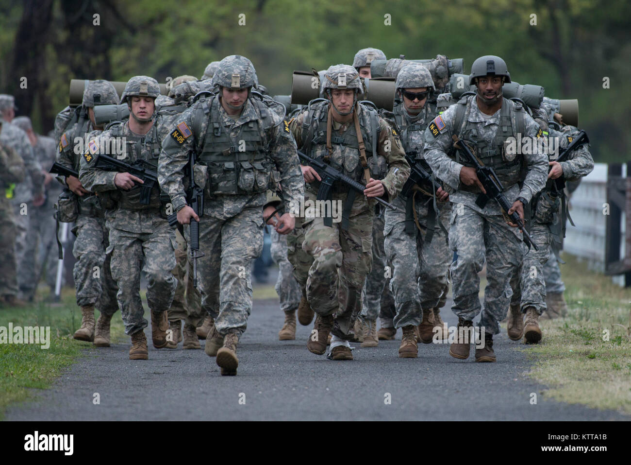 U.S. Army National Guard Soldiers conduct a timed, twelve-mile ruck ...