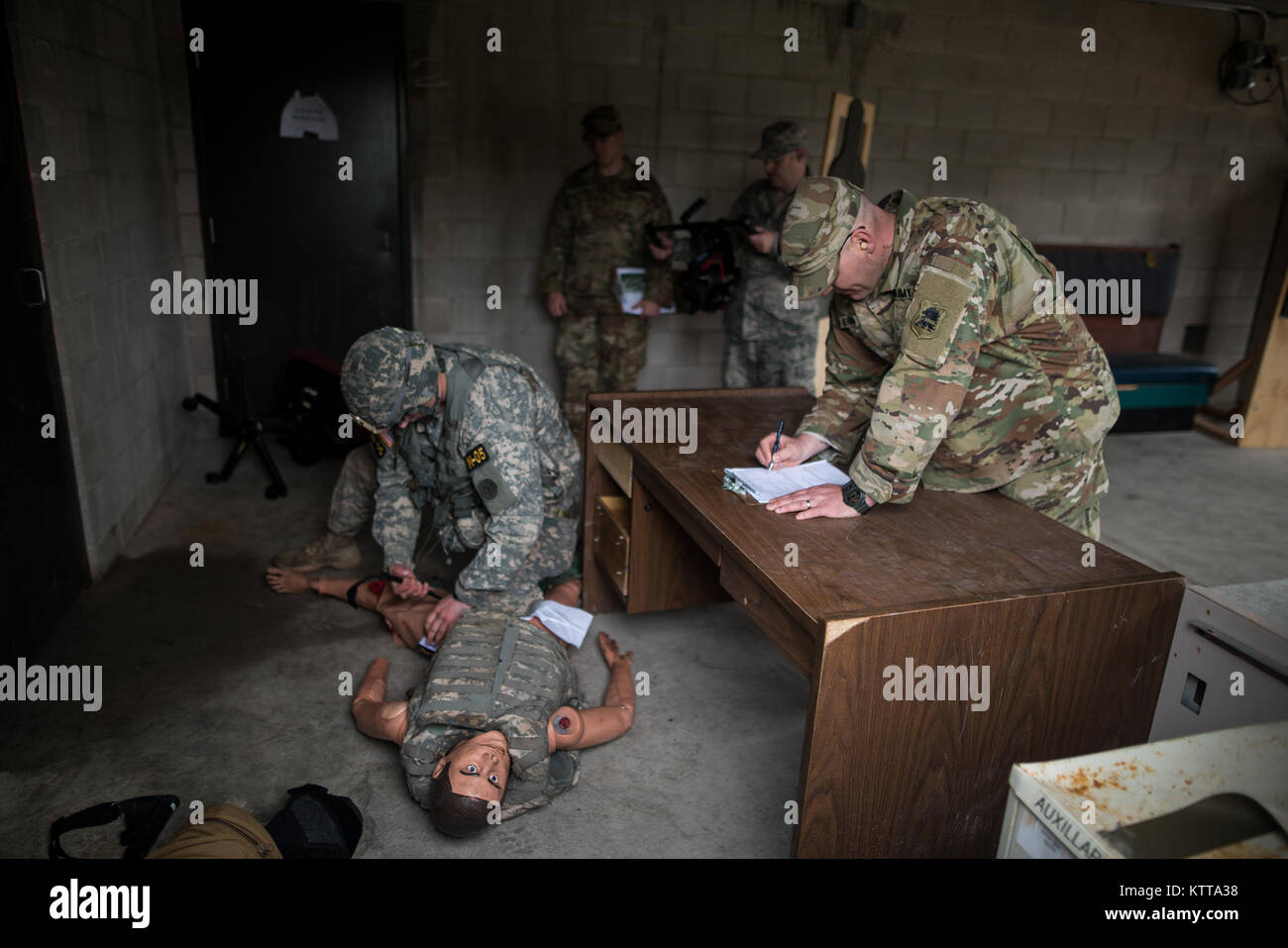 New York Army National Guard Sergeant Mitchell Stogel treats a rescue ...