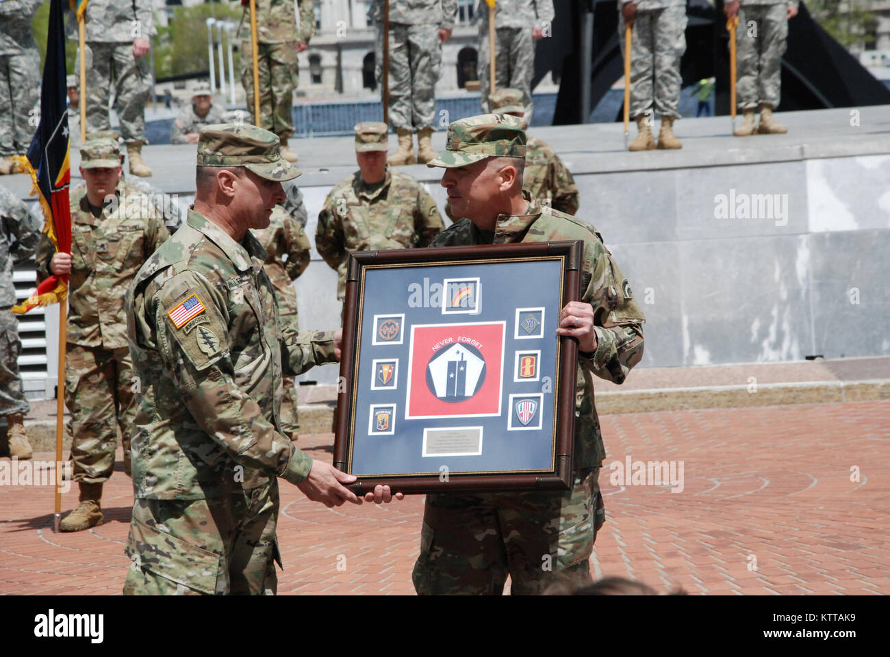 U.S. Army Brig. Gen. Steven Ferrari presents a gift to Maj. Gen. Harry ...