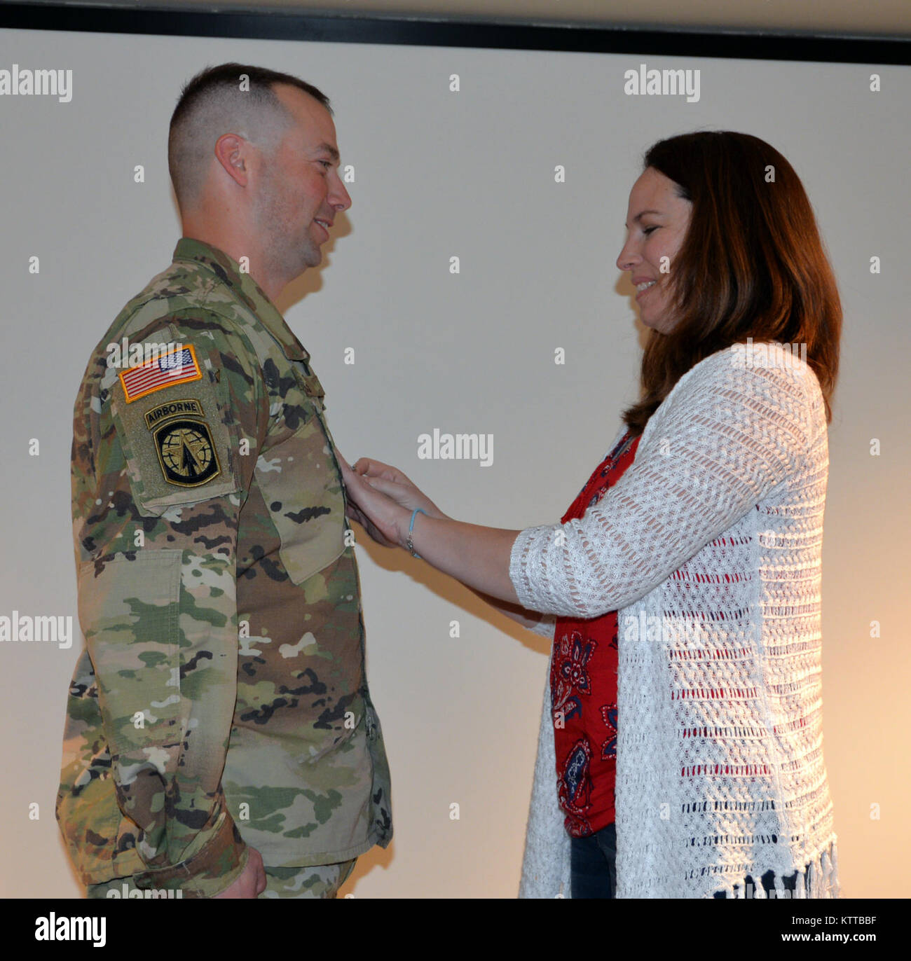 Laura Blass (right) and her husband Michael J. Blass (left) smile as ...
