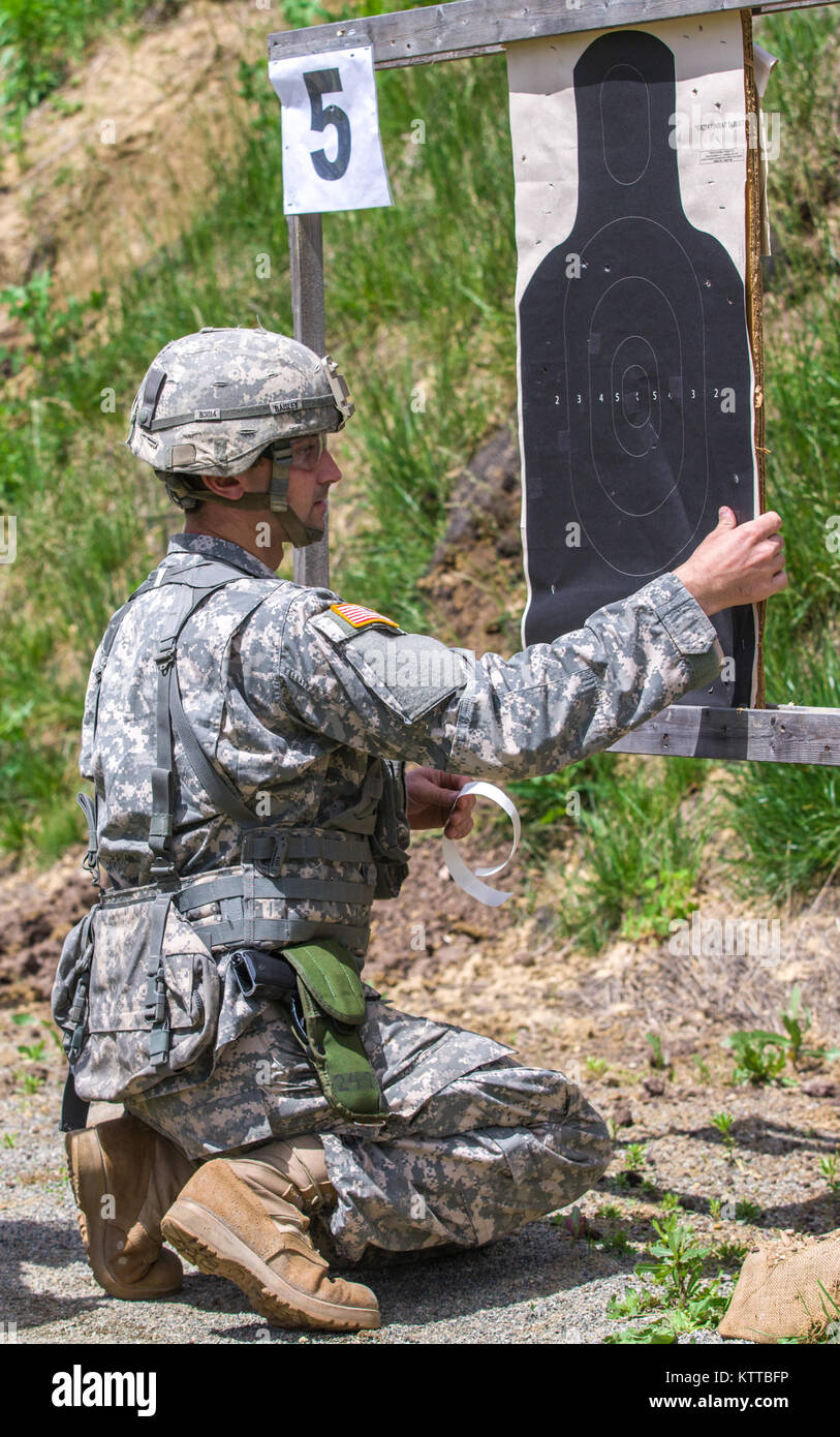 U.S. Army Sgt. James Baisley, with the 204th Engineer Quarry Detachment ...