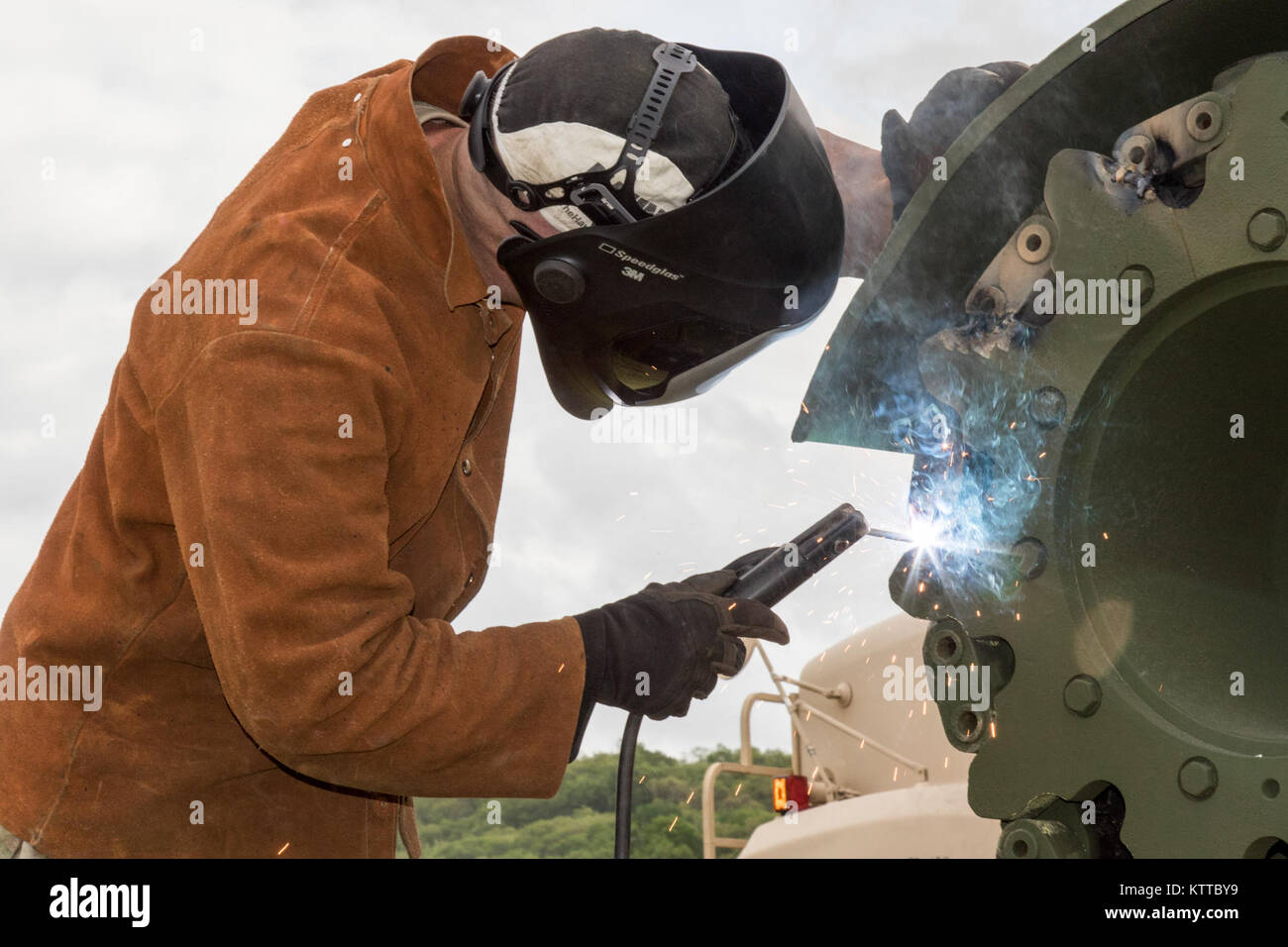 U.S. Army Staff Sgt. Cory Peck, a welder for the New York Maneuver Area ...