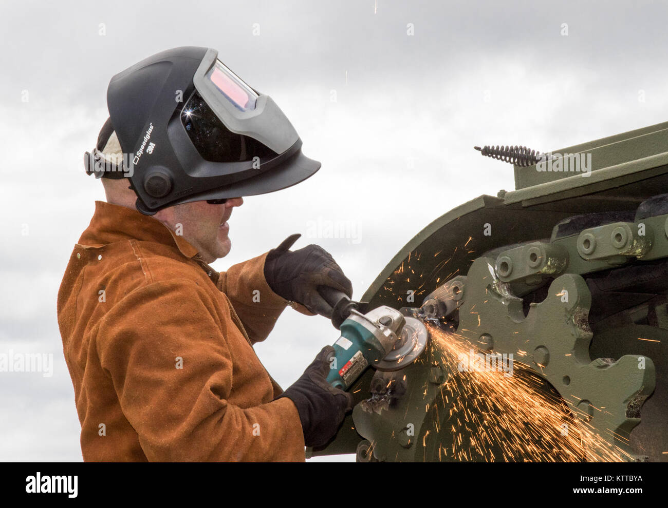 U.S. Army Staff Sgt. Cory Peck, a welder for the New York Maneuver Area ...
