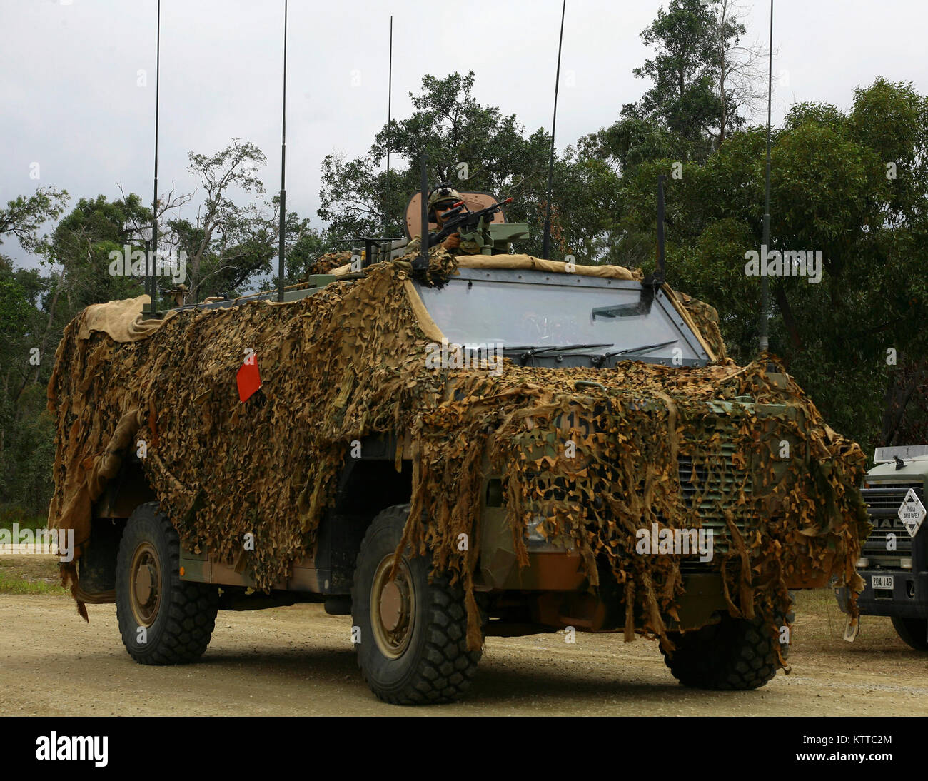 SHOALWATER BAY, AU – An Australian Defense Forces soldier mans an F89M1 ...