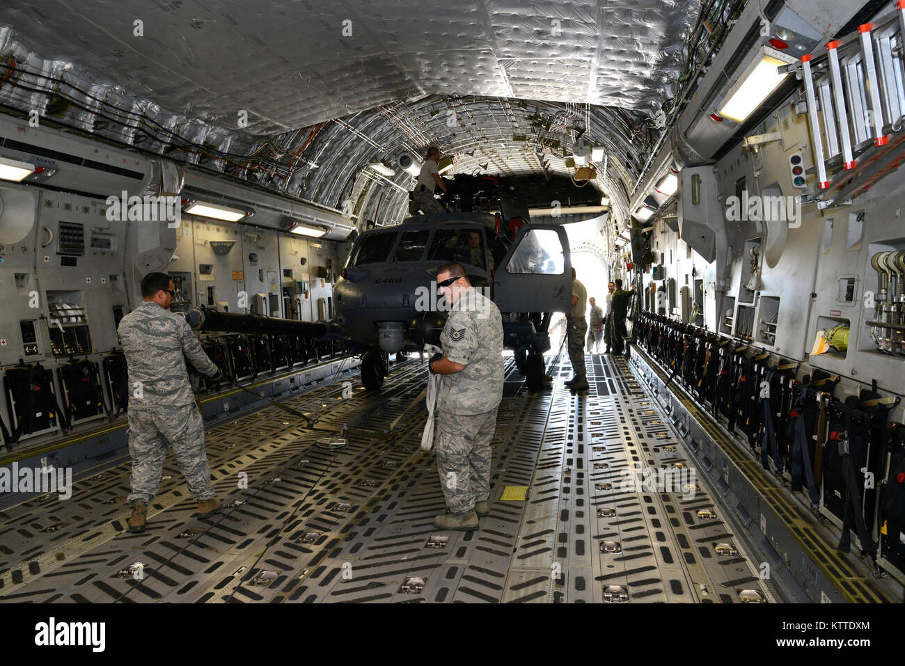Airmen assigned to the 105th Airlift Wing and 106th Rescue Wing load ...