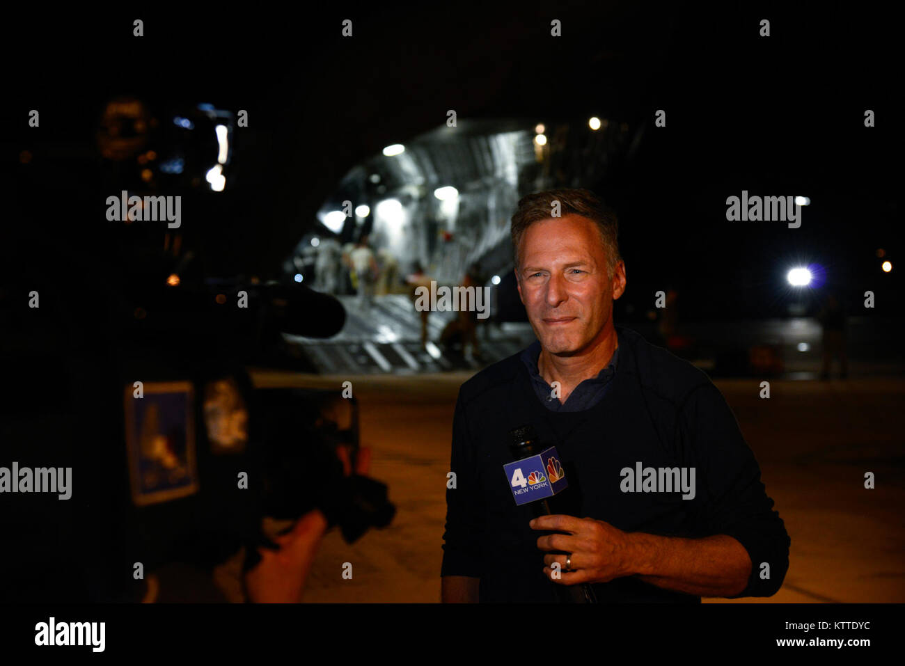 NBC News Anchor Michael Garguilo prepares to record a news spot in ...