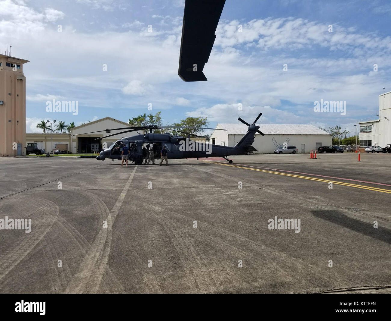 Crew members from the 101st and 103rd Rescue Squadrons prepare for ...