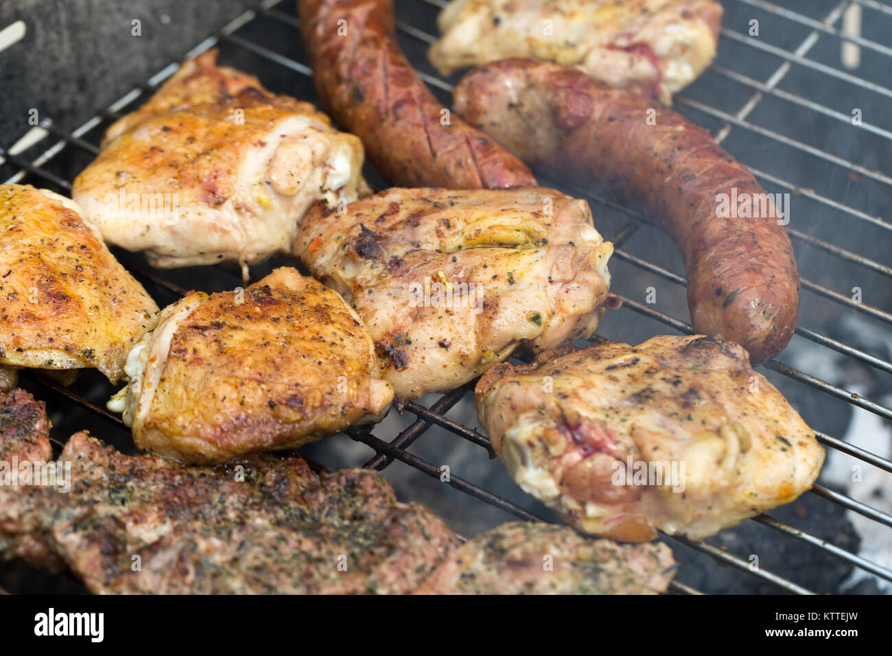 barbecue with delicious grilled meat on grill Stock Photo - Alamy