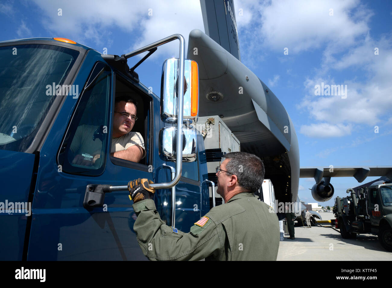 Airmen assigned to the 105th Airlift Wing load specialized ...