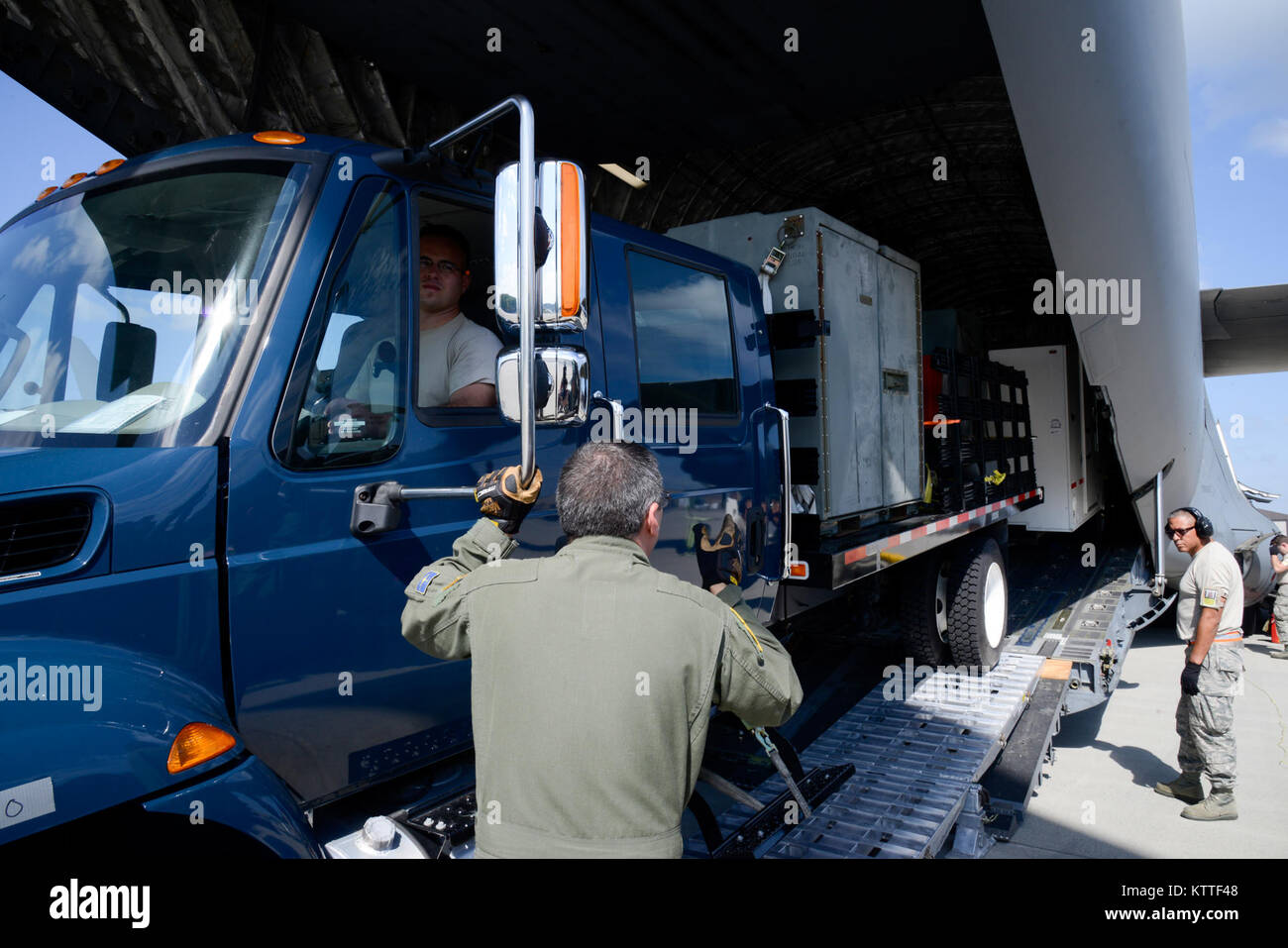 Airmen assigned to the 105th Airlift Wing load specialized ...
