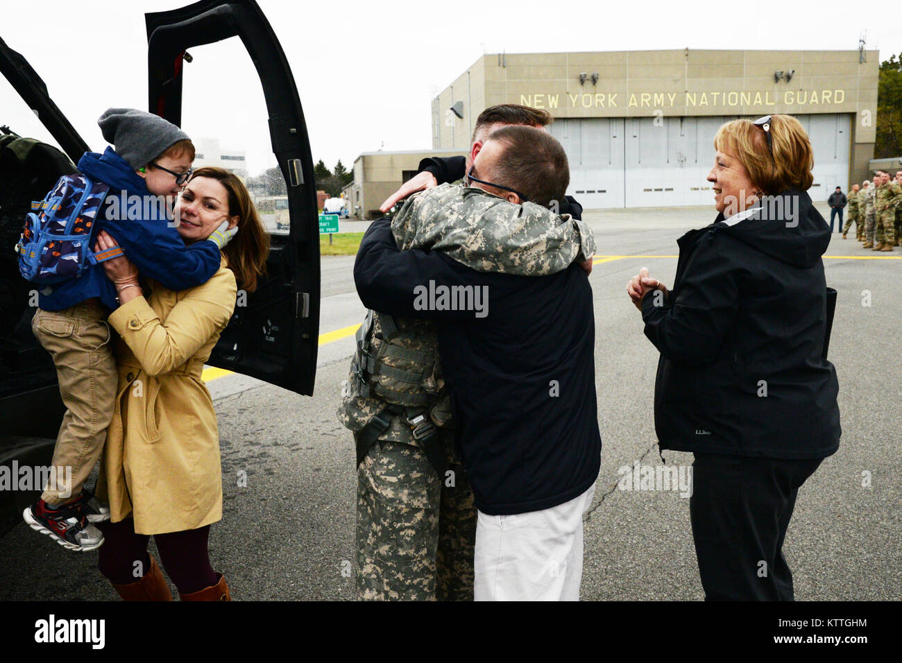New York Army National Guard Soldier, Maj. Michael Audette, greets his ...