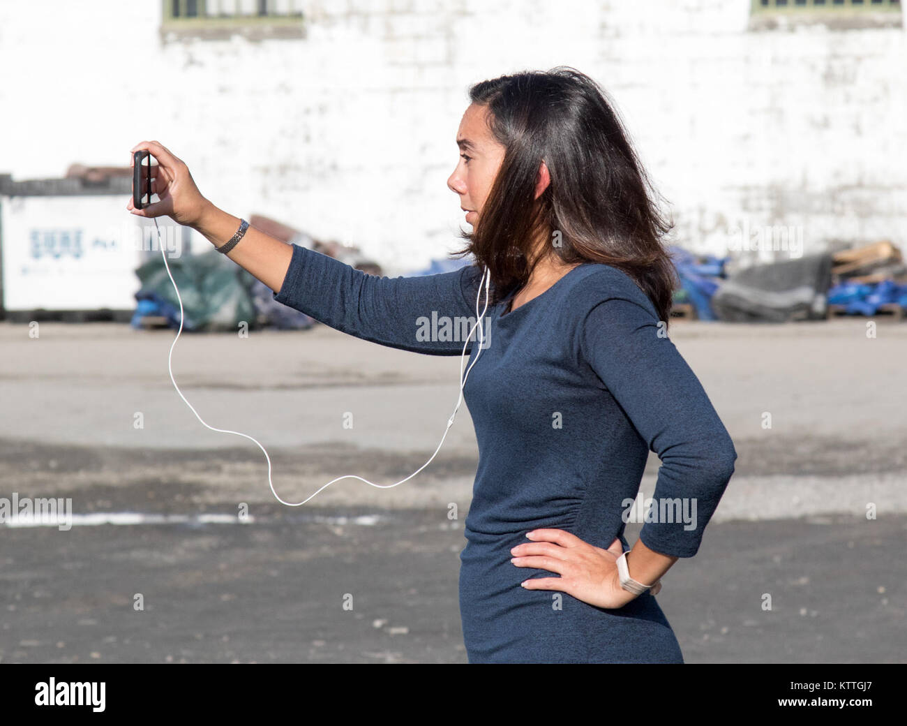 Lisa Reyes, a reporter with News 12 in Westchester, takes a moment to ...
