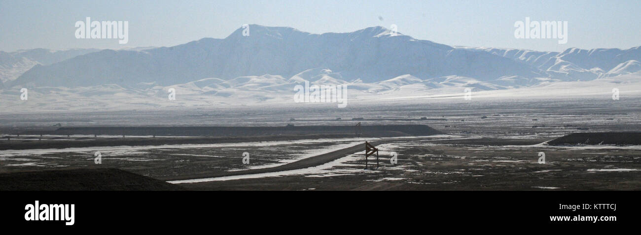 Beyond the ranges at Camp Mike Spann, Afghanistan, rest rows of snow ...