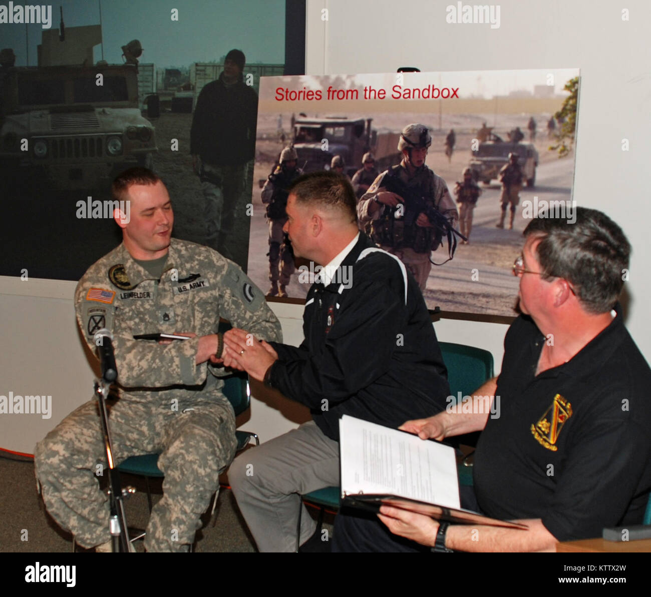 U.S. Representative Chris Gibson presents a souvenior of his service in ...