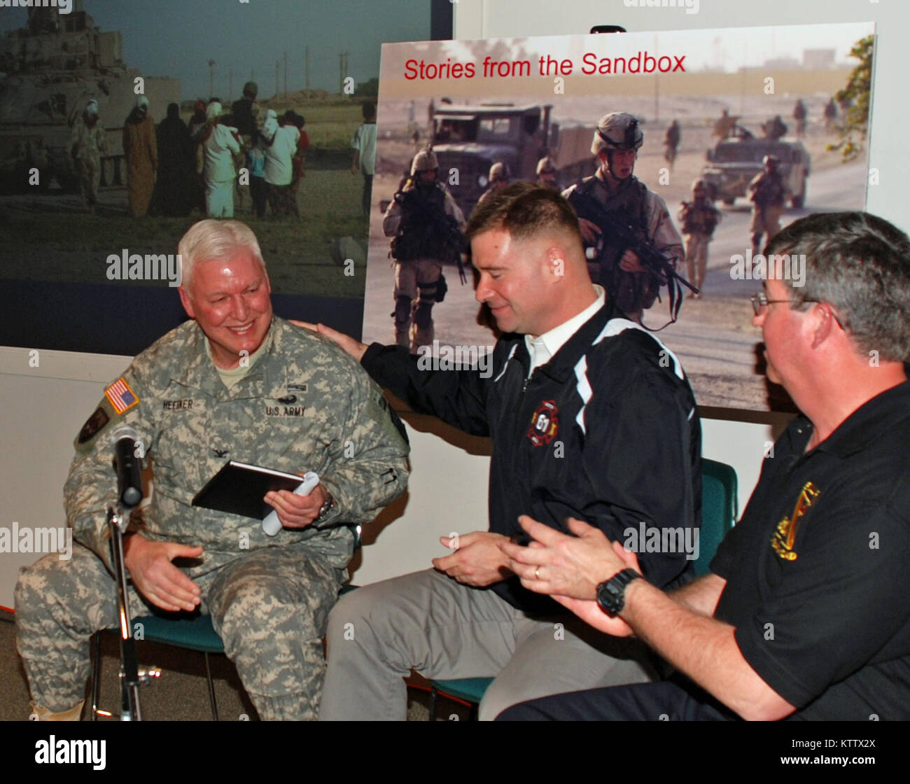 U.S. Representative Chris Gibson presents a souvenior of his service in ...
