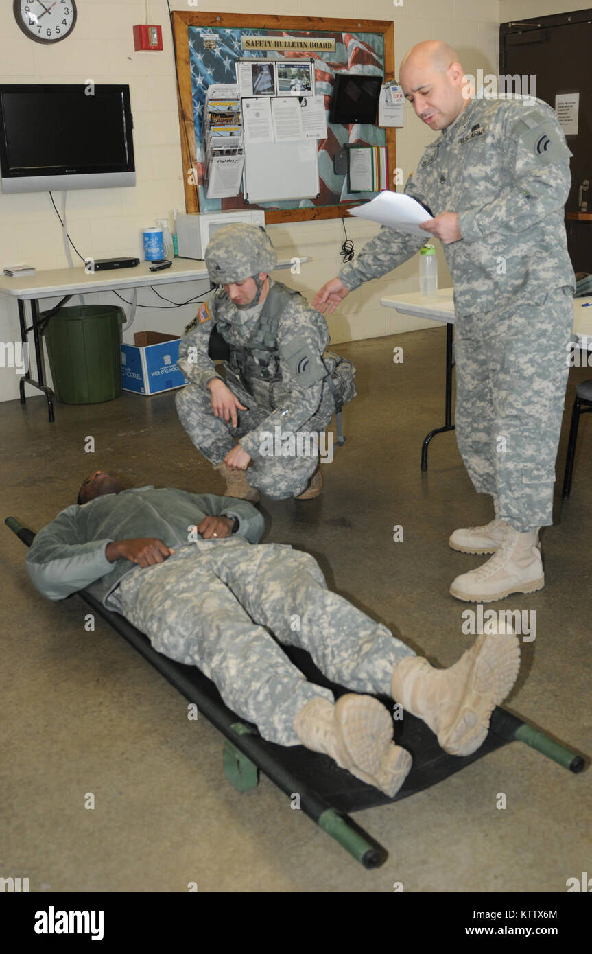 Sgt. Justin Zuchowski prepares to demonstrate procedures during the ...