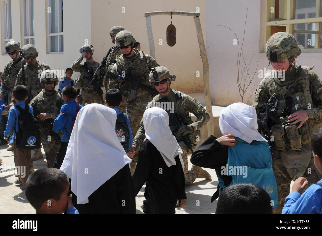 Soldiers of the 37th Infantry Brigade Combat Team shake hands with ...