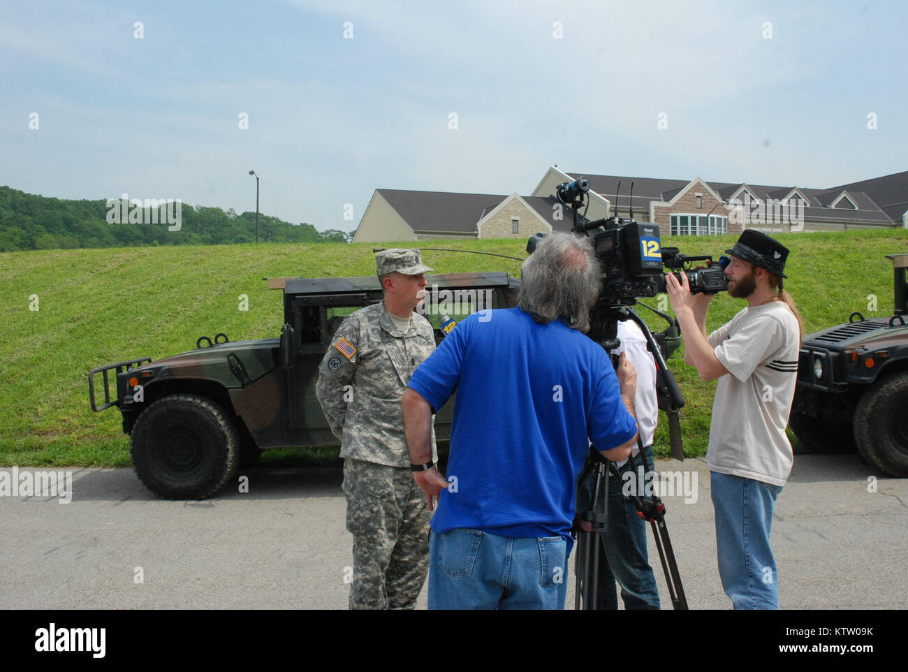 CAMP SMITH--TV news crews interview New York Army National Guard ...