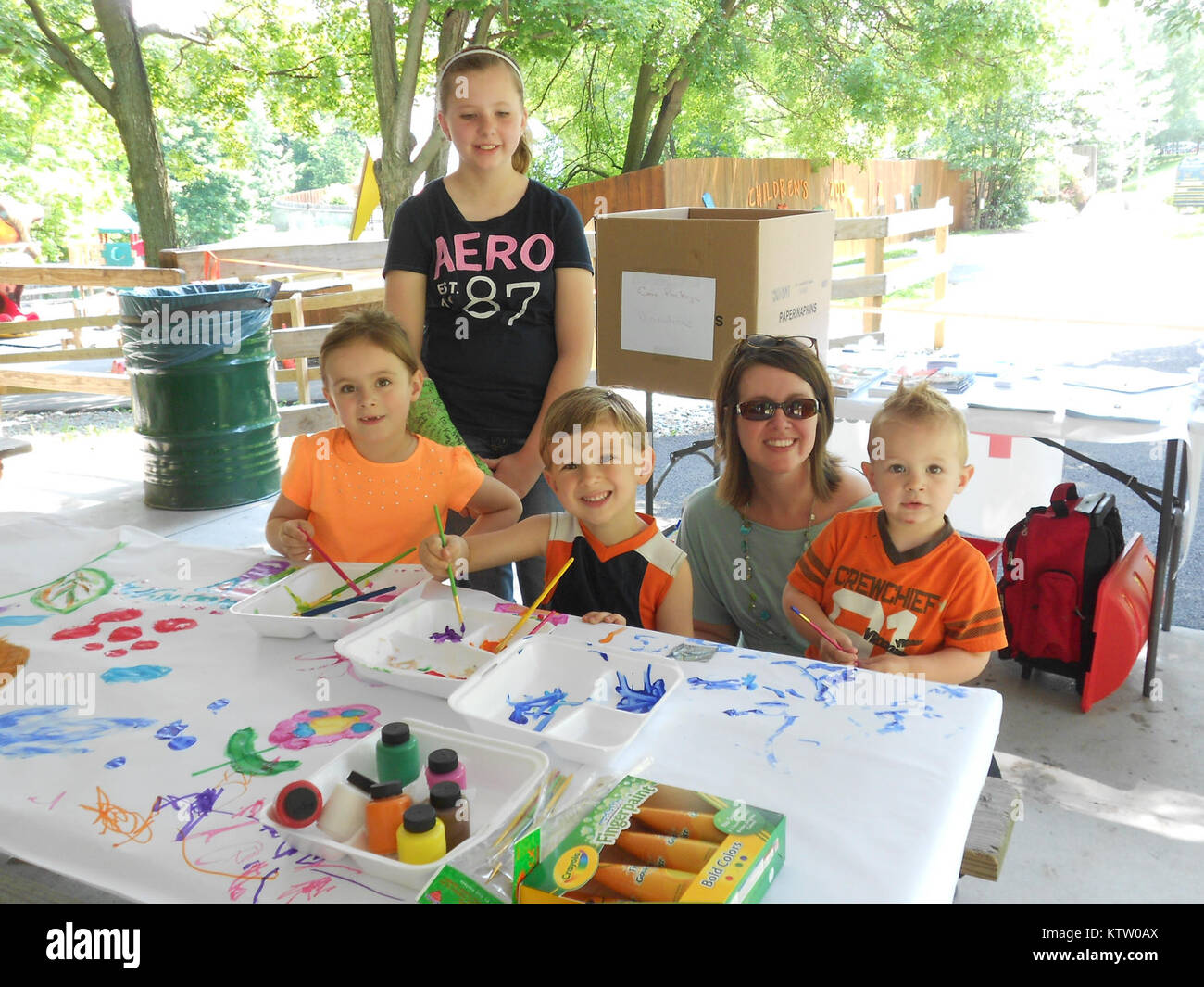 Kori Ayres, the wife of Chaplain Andrew Ayres with their three children ...