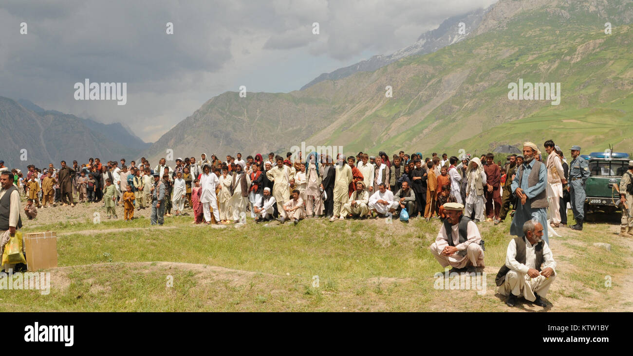Afghan villagers gather near Khwahan, Badakhshan Province, Afghanistan ...