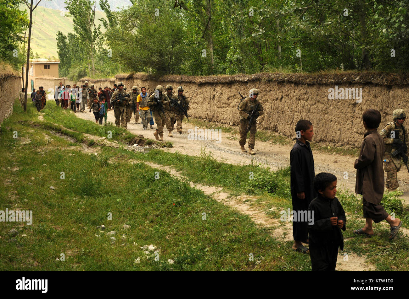 Soldiers of the 37th Infantry Brigade Combat Team and villagers of ...