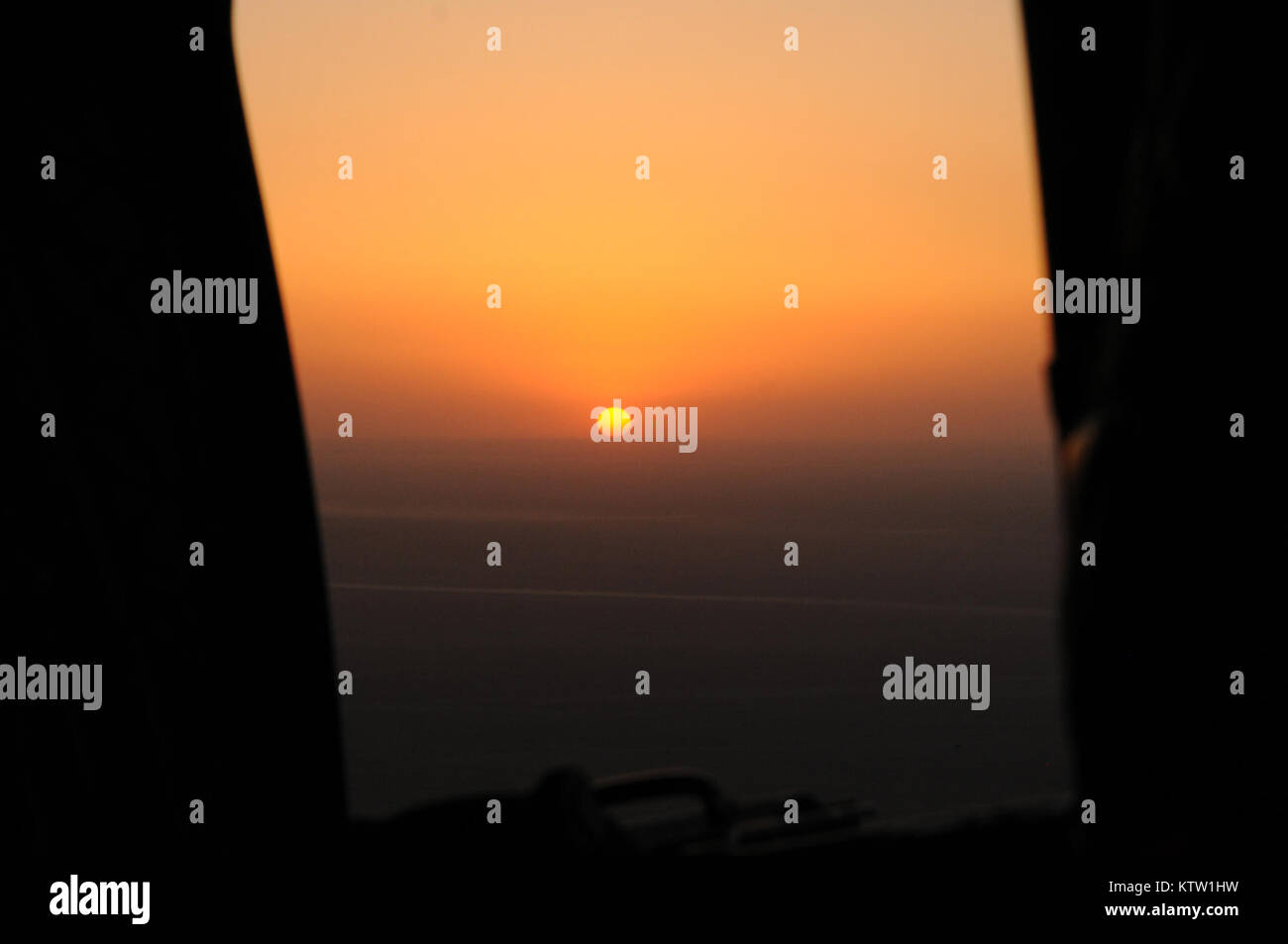 The view from the gunner's window on a Chinook helicopter as the sun ...